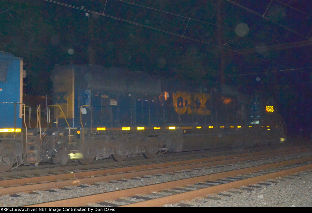 CSX SD70AC 4528 leads Q741-10 west through Woodbourne. CSX SD70AC 4799 trailed.